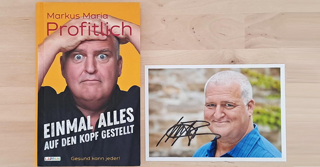 Comedian Markus Maria Profitlich signiert sein Buch