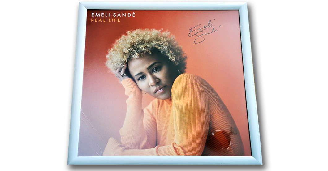 Emeli Sandé signs her strictly limited Vinyl LP "Real Life"