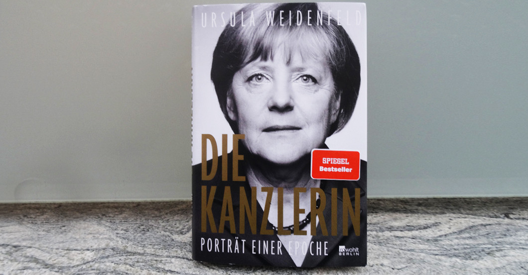 Angela Merkel Signs her Biography "Die Kanzlerin"