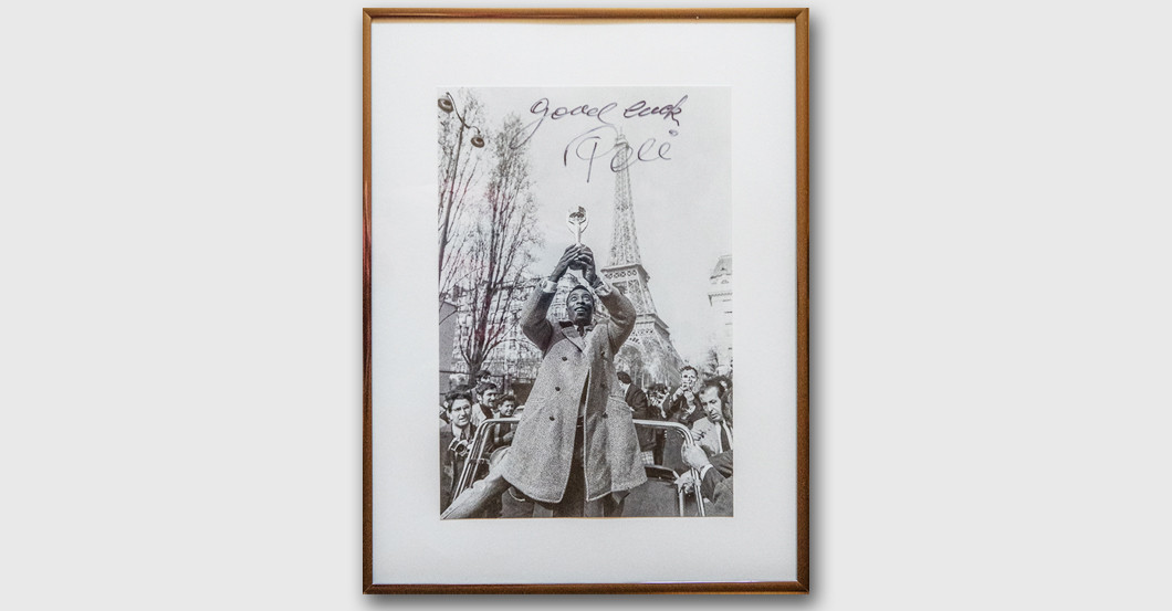 Pelé with the World Cup Trophy: Photograph Signed by the Legend
