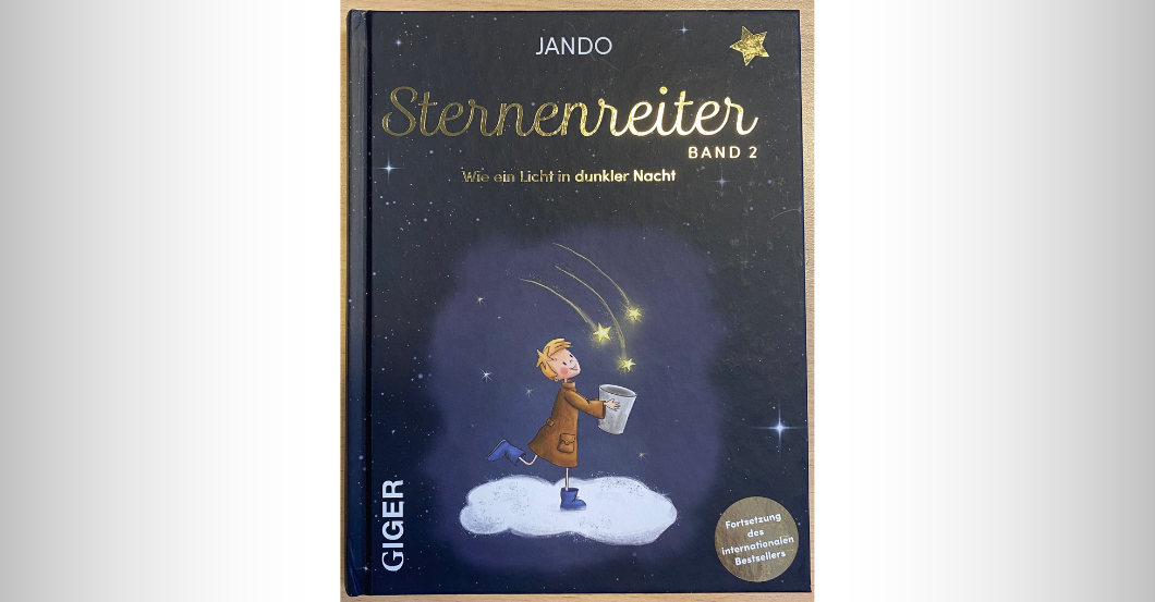 Bestseller-Autor Jando signiert sein Buch „Sternenreiter“ Band 2