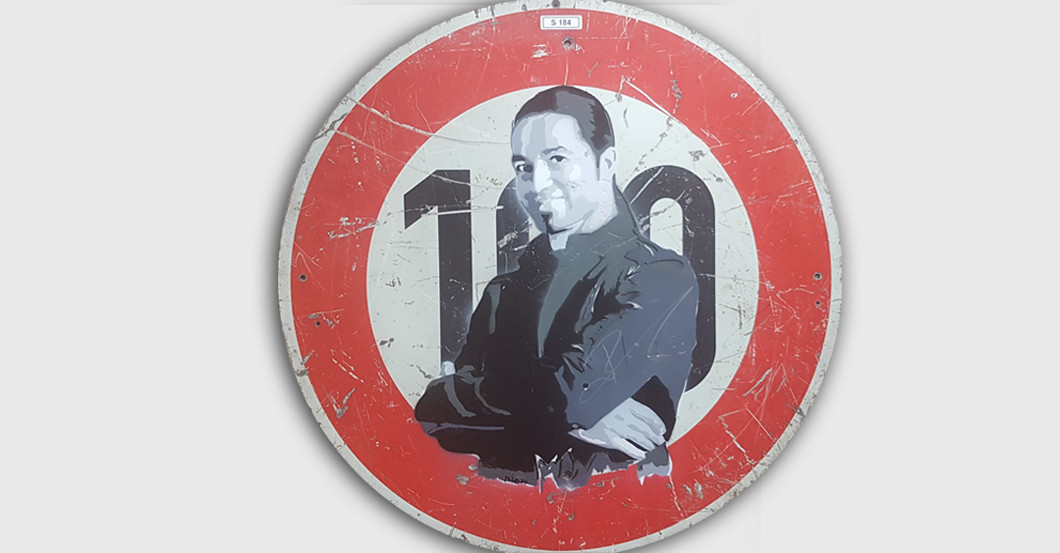 Bülent Ceylan Signed an Artwork on a Road Sign